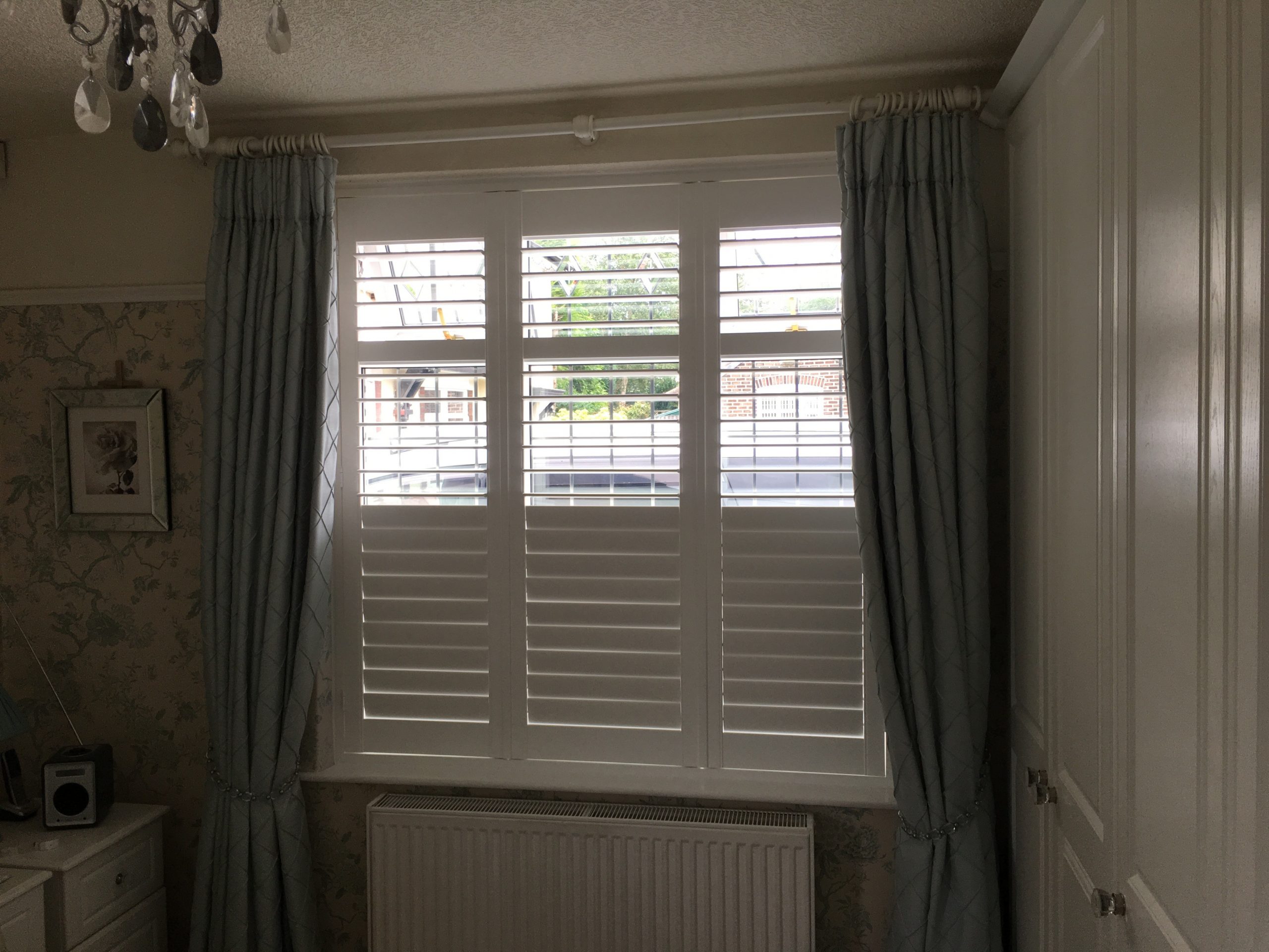 Bi-Folding White Plantation Shutters in Urmston, Manchester | Absolute Shutters